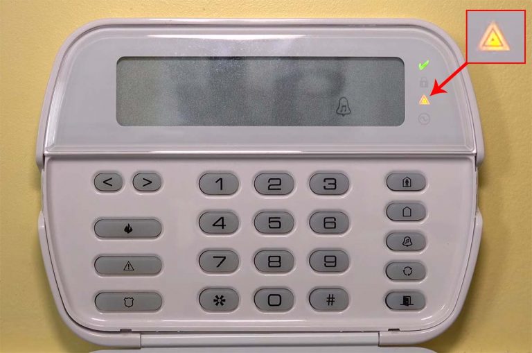 What is the yellow triangle on ADT DSC Impassa Alarm System ...